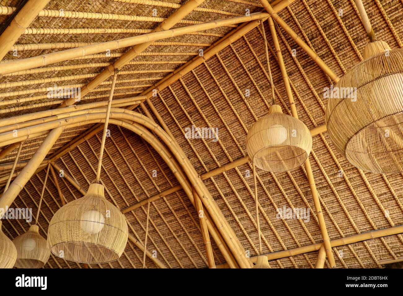 Traditional style chandelier. made from rattan wood. Ecological house ...