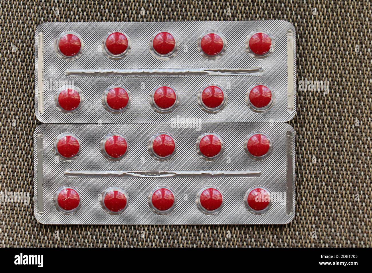 Small prescription medicine red pills inside silver blisters Stock ...