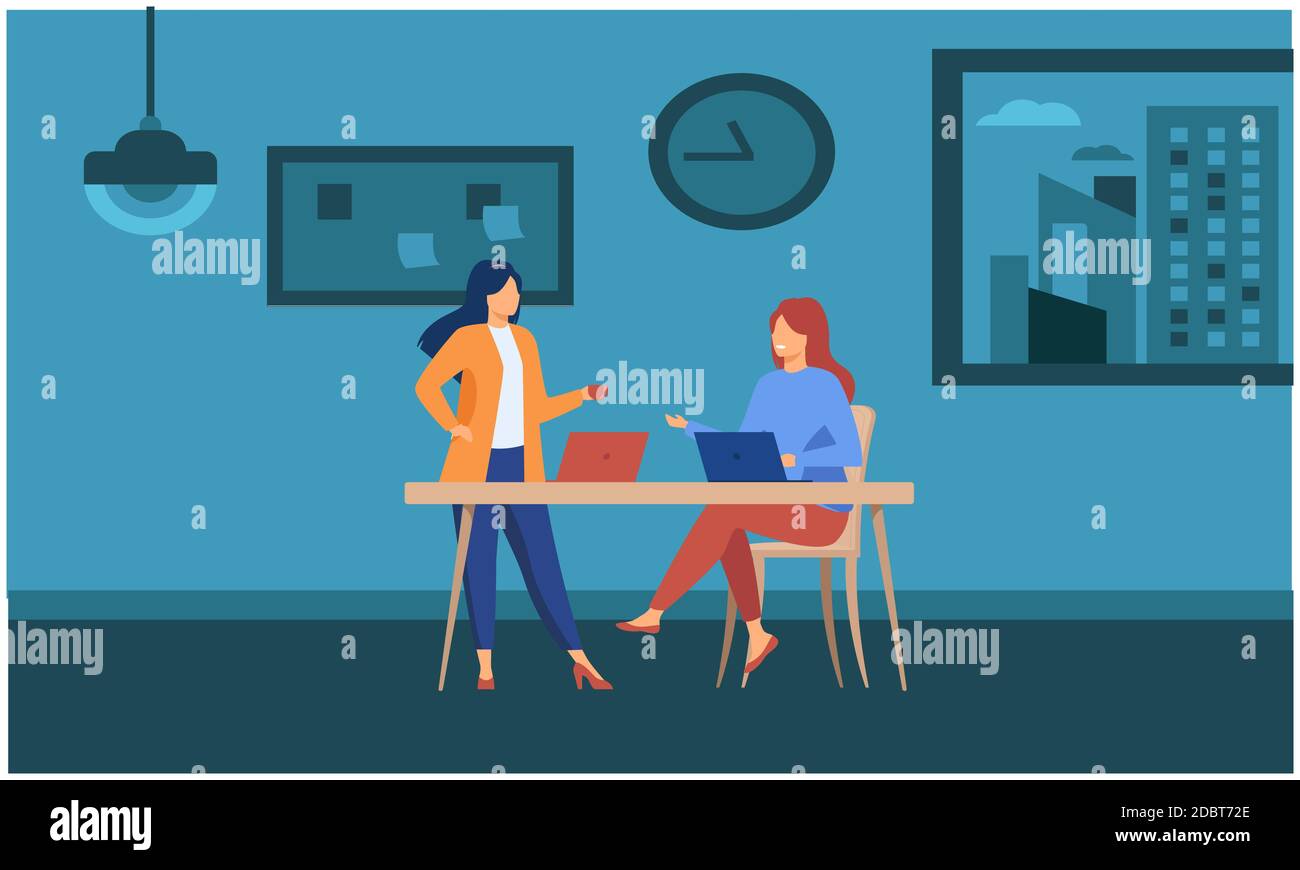 two girls are discussing in a meeting Stock Photo - Alamy