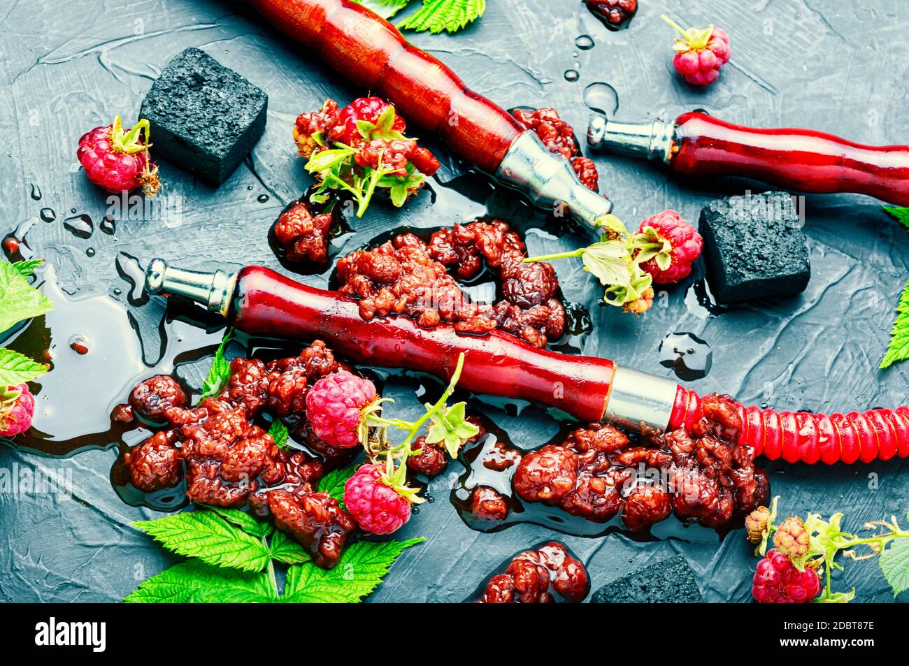 Oriental smoking hookah with tobacco with the aroma of raspberry jam ...