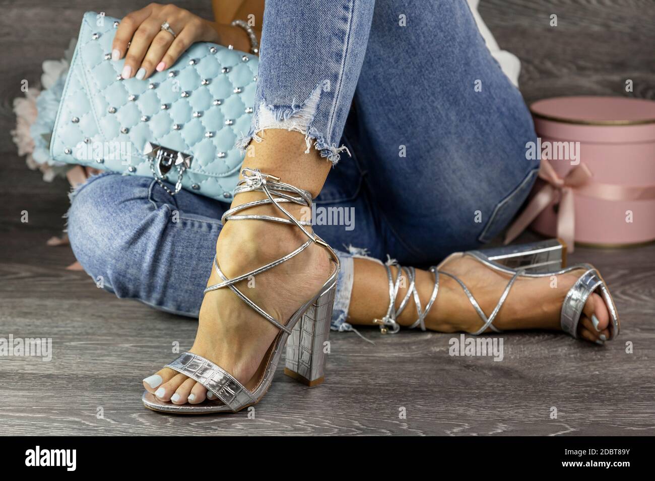 Woman posing in stylish high heel shoes. Beauty and Fashion concept ...