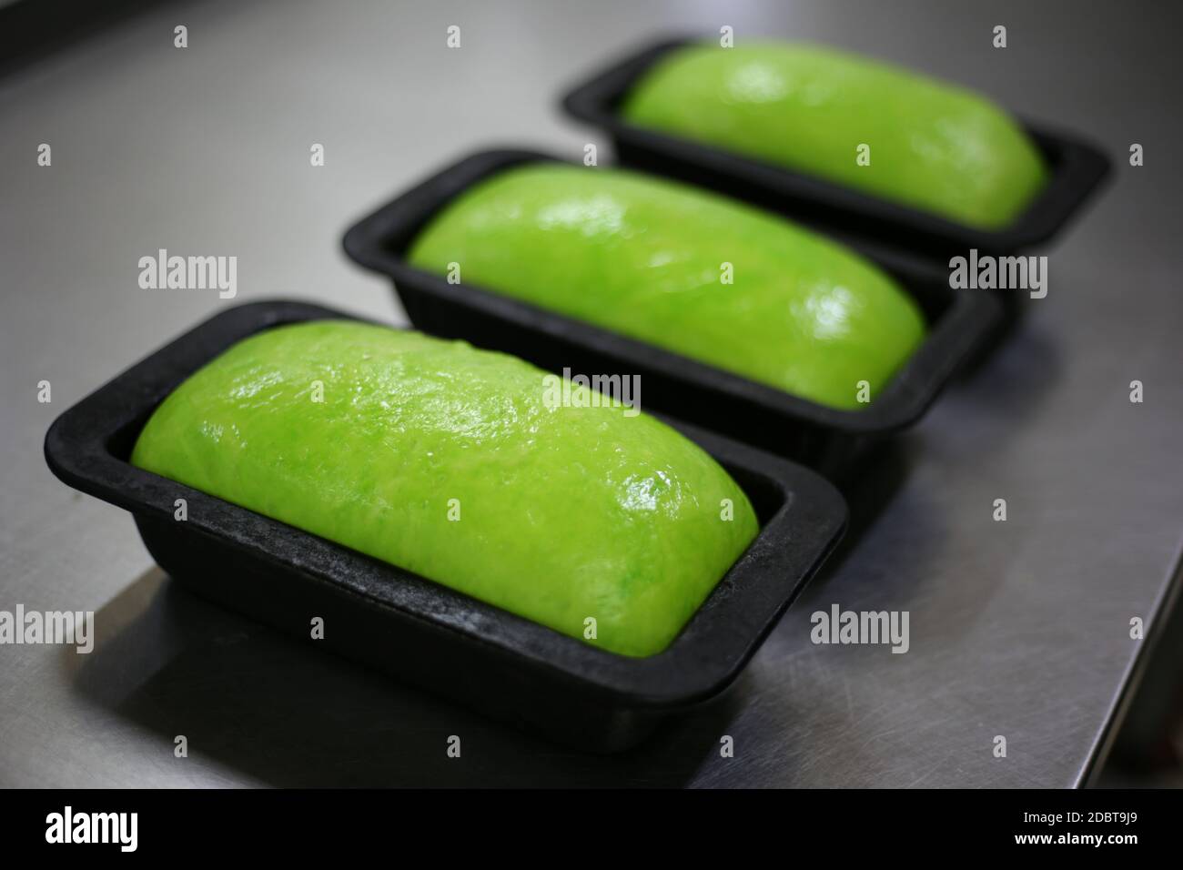 Green bread that is being prepared will go to the oven. Green bread ...