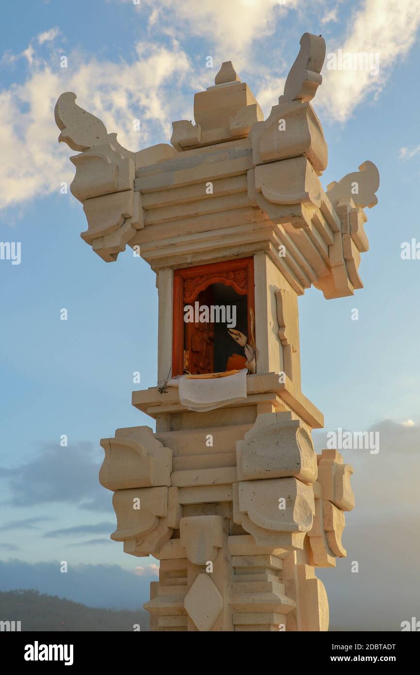 Hindu offering altar located in Bali in Indonesia. Dramatic sunset ...