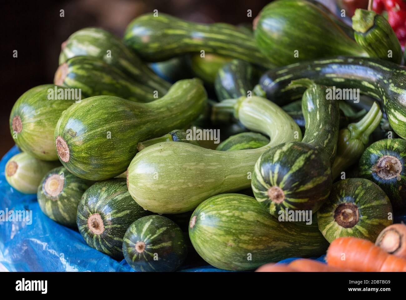 Close up of green courgettes at a market vegetable stall Stock Photo ...
