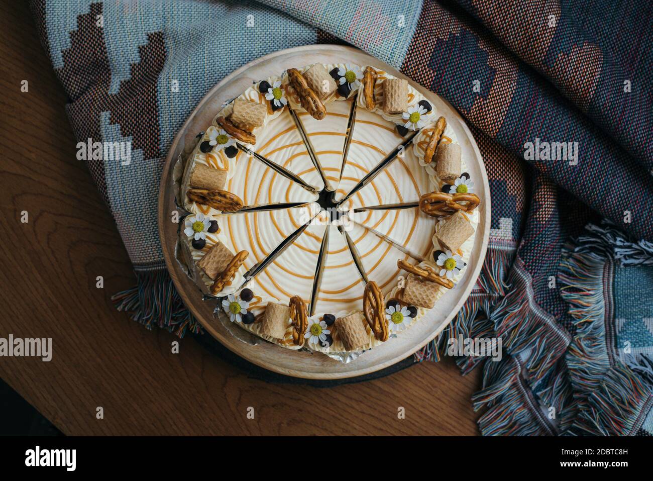 Caramel Cake on rustic aztec blanket background Stock Photo - Alamy