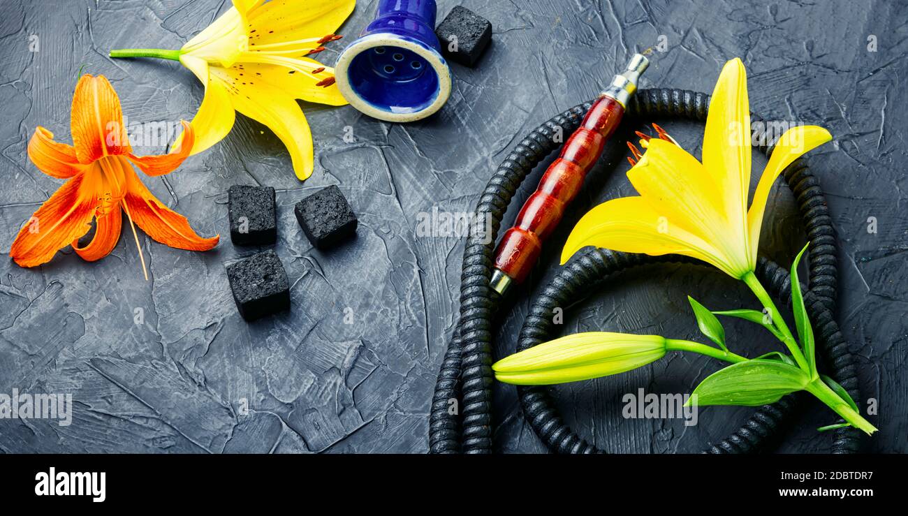 Asian smoking hookah with fragrant flower tobacco.Lily flavor shisha ...