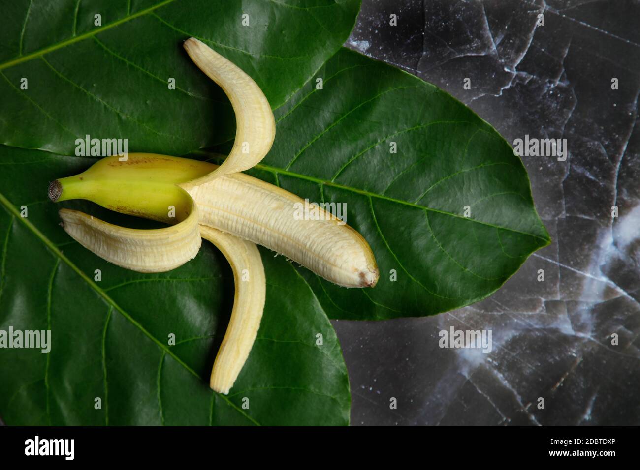 Fresh banana on natural background Stock Photo - Alamy