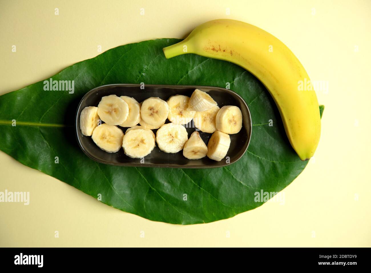 Fresh banana on natural background Stock Photo - Alamy