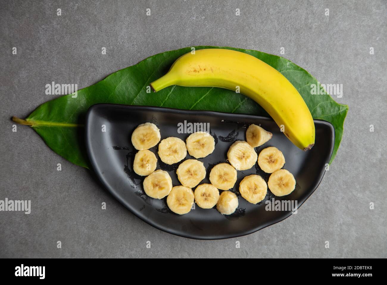 Fresh banana on natural background Stock Photo - Alamy