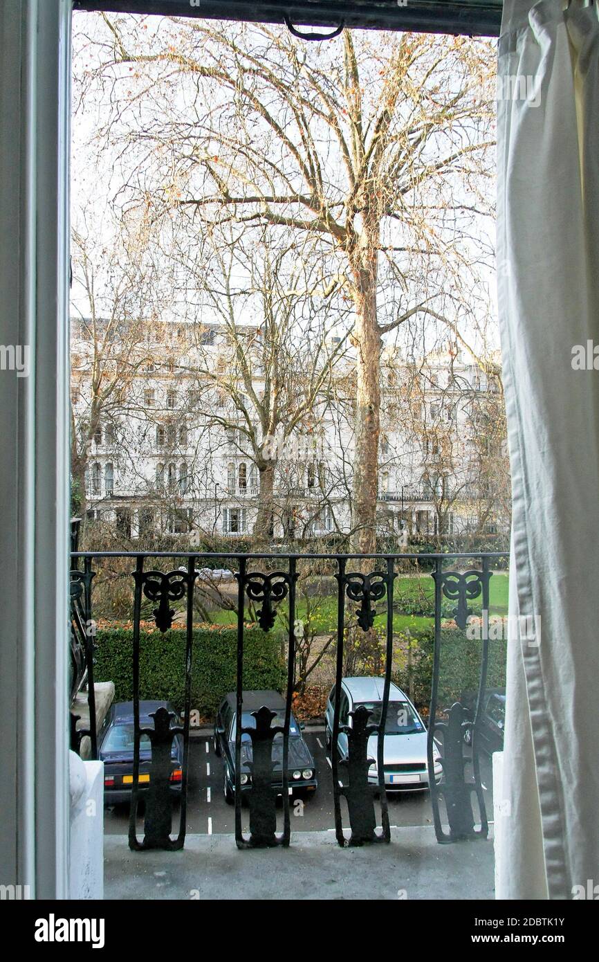 Park view from apartment through big window Stock Photo - Alamy