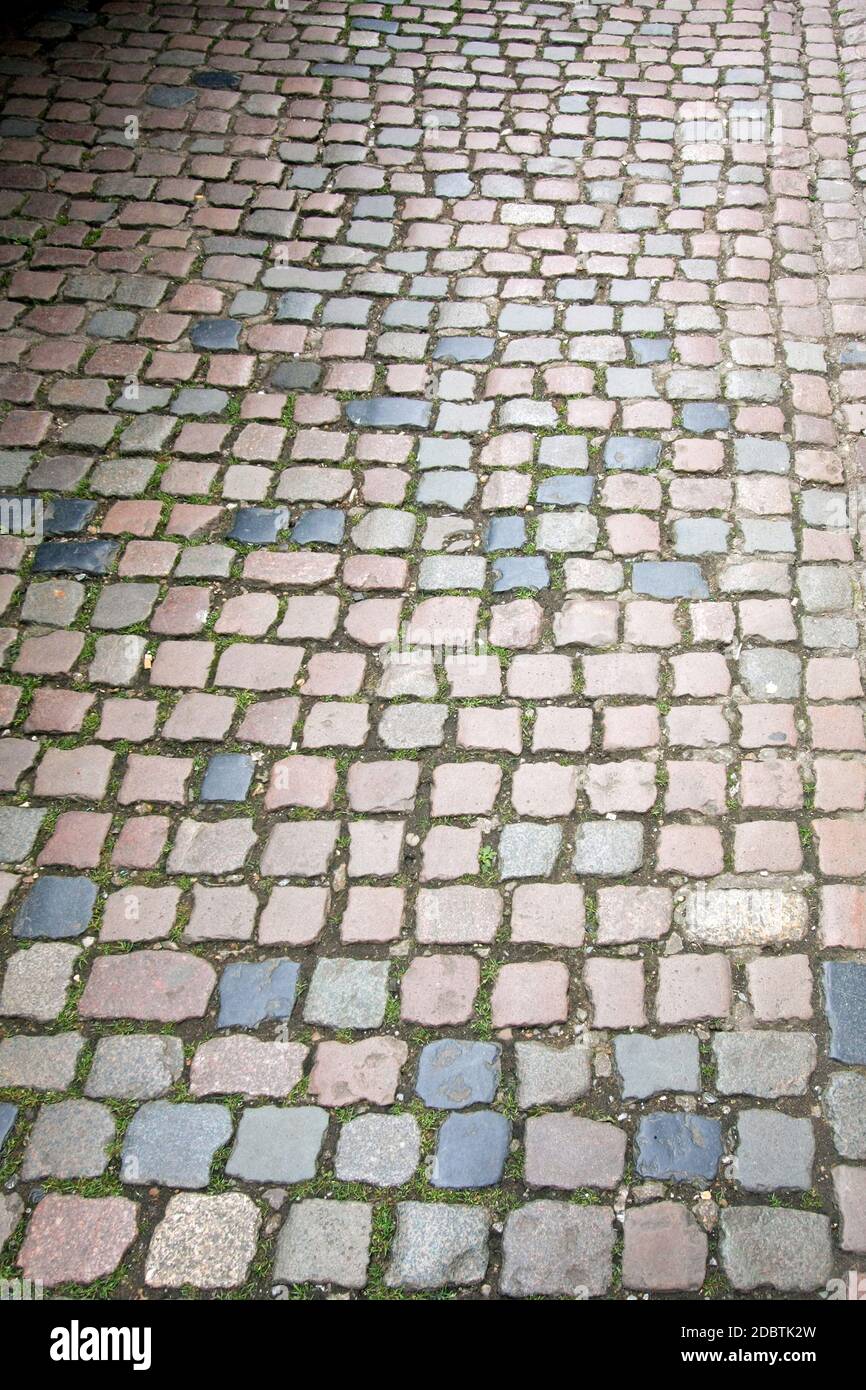 Medieval pavement side walk with square bricks Stock Photo - Alamy