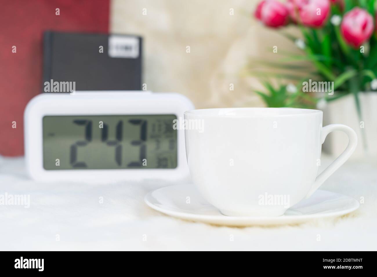 Digital clock and cup of coffee ,Coffee time Stock Photo - Alamy