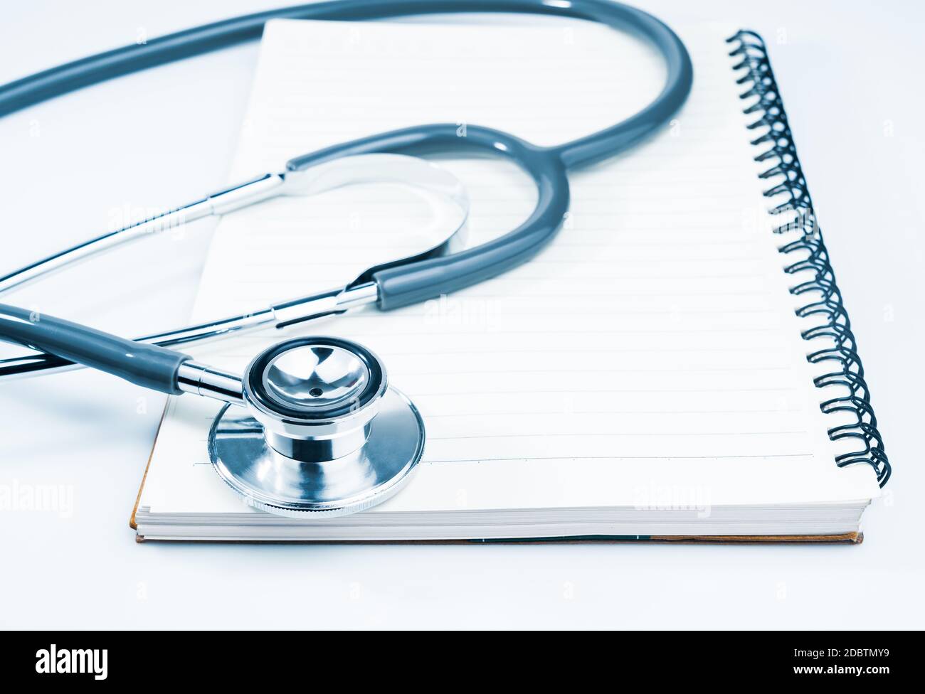 Medical stethoscope on blank notepad as medical concept Stock Photo - Alamy