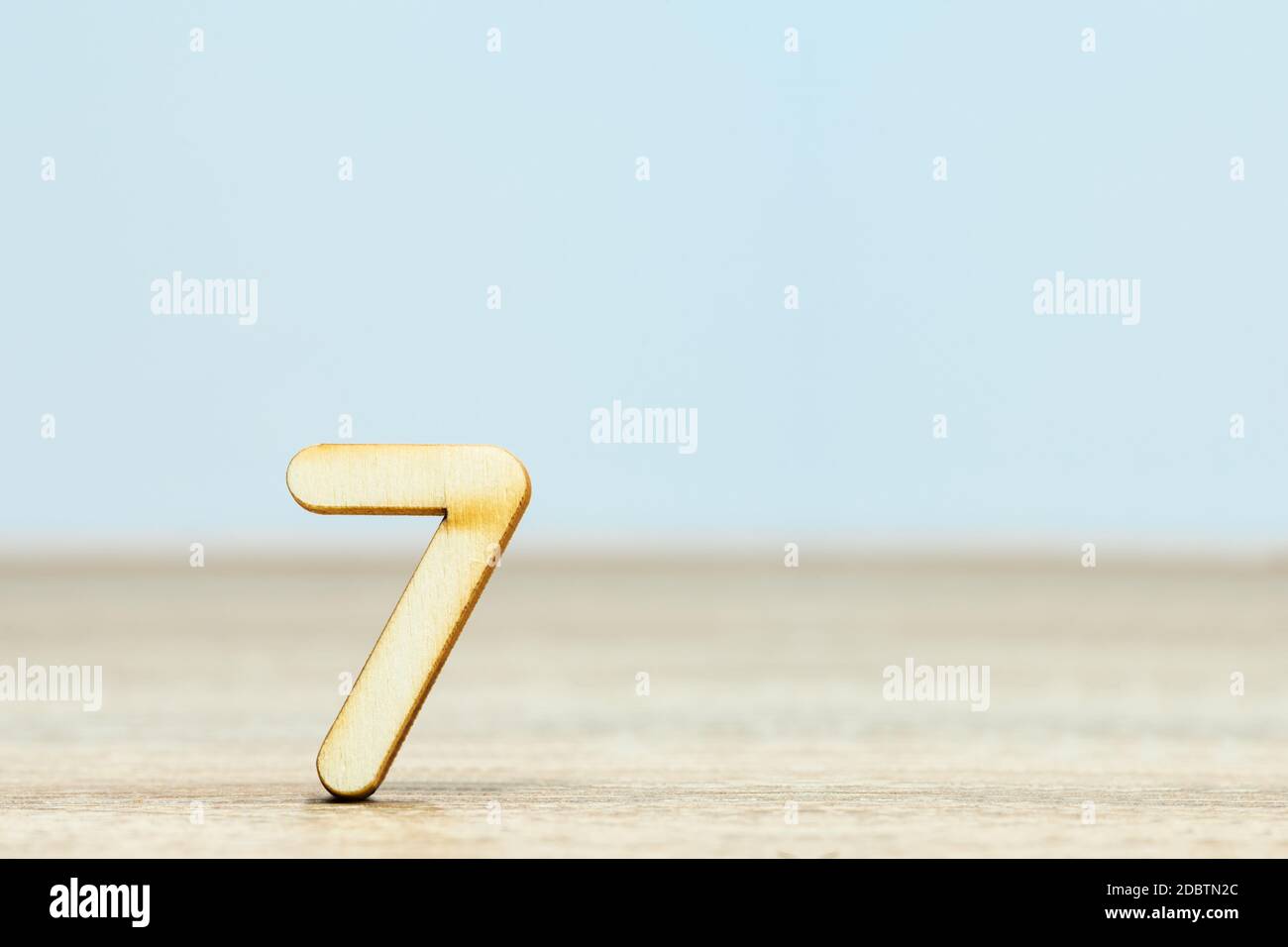 Close up wooden numeric on table with copy space,number seven Stock ...