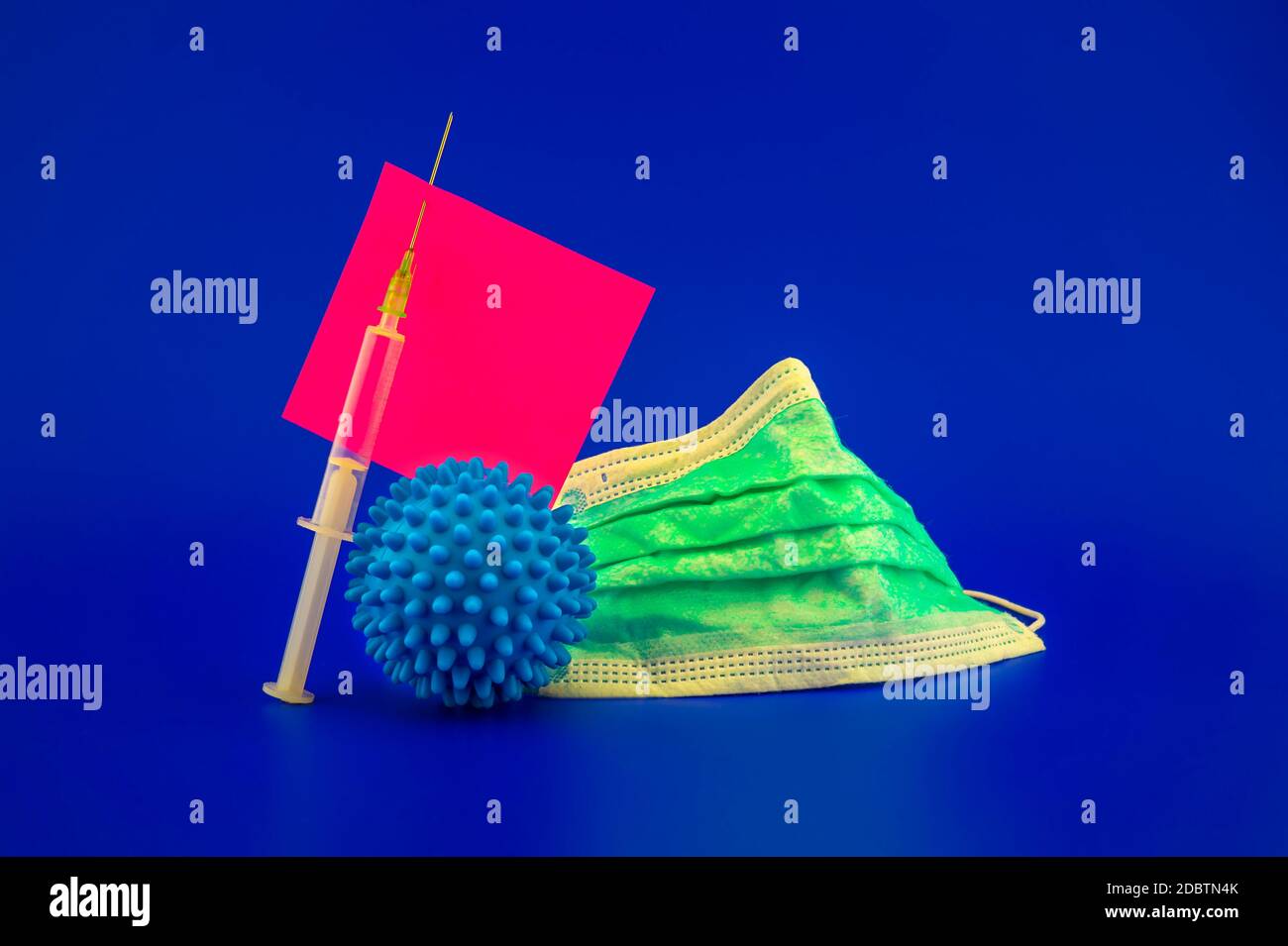 Virus pandemic and possible vaccine concept with surgical mask ...