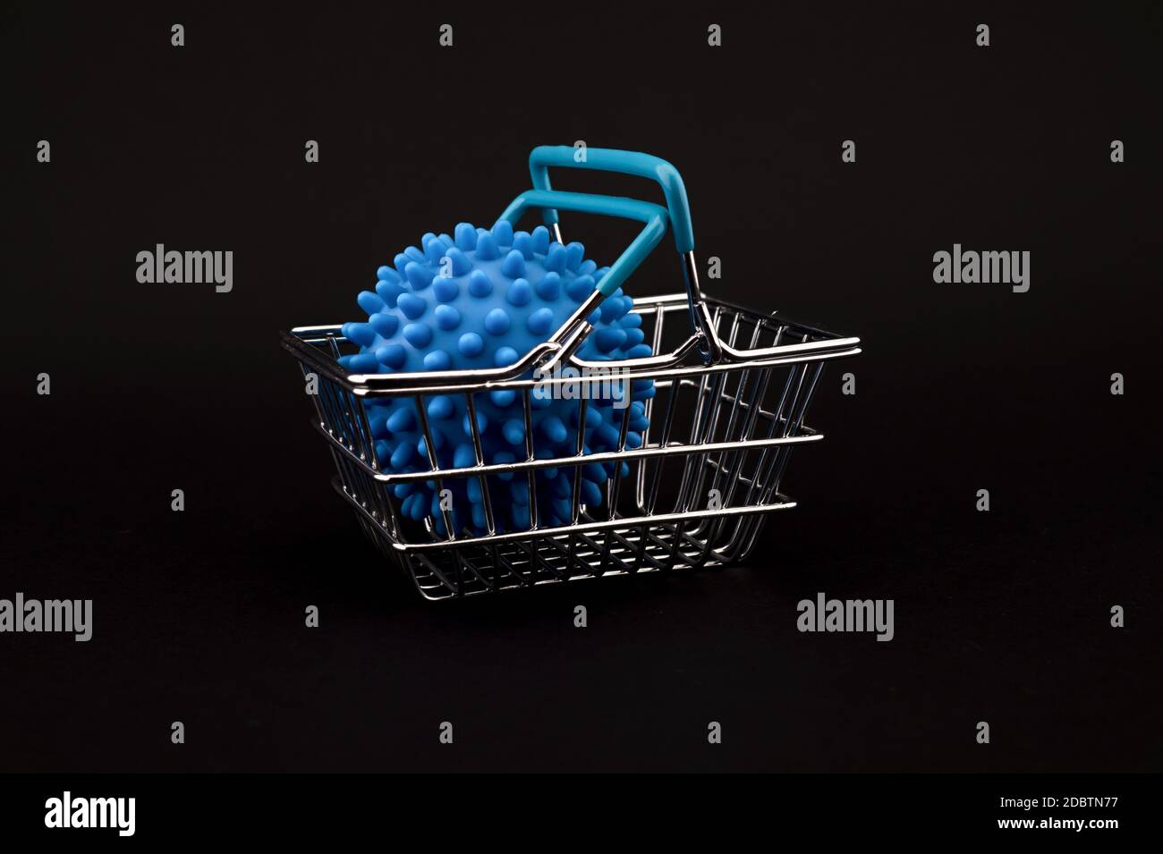 Blue virus molecule in a shopping basket conceptual of the possibility ...