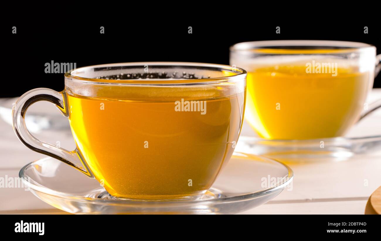 Green tea mug with green leaves and close-up horizontal photo.English ...
