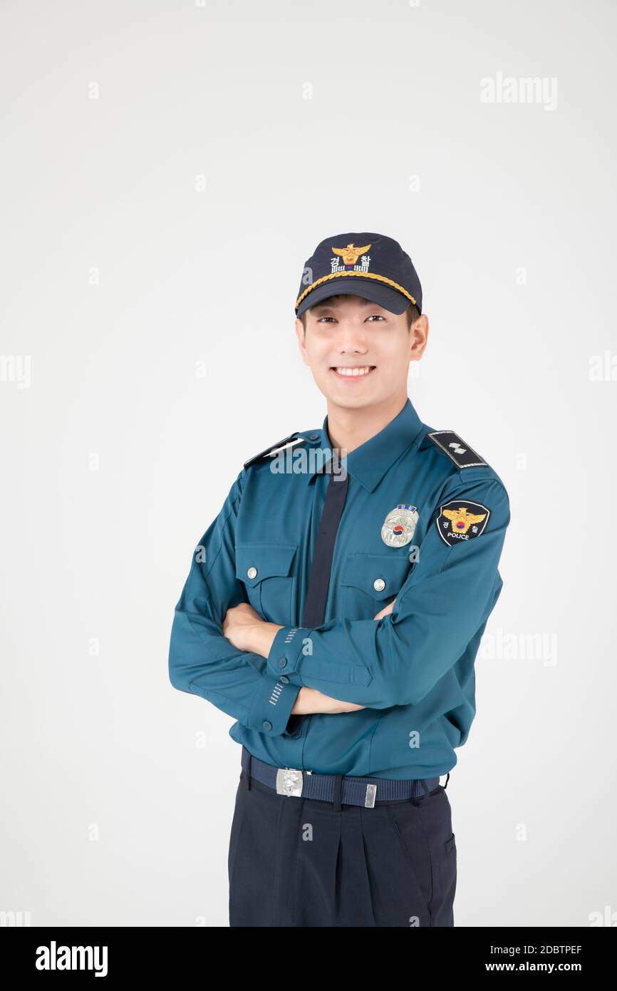 Asian male and female two police officers 007 Stock Photo - Alamy