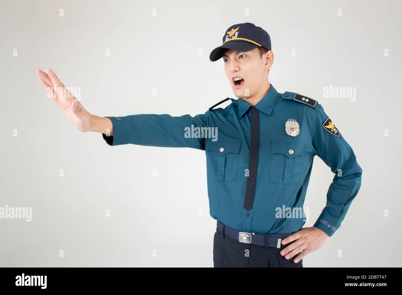 Asian male and female two police officers 023 Stock Photo - Alamy