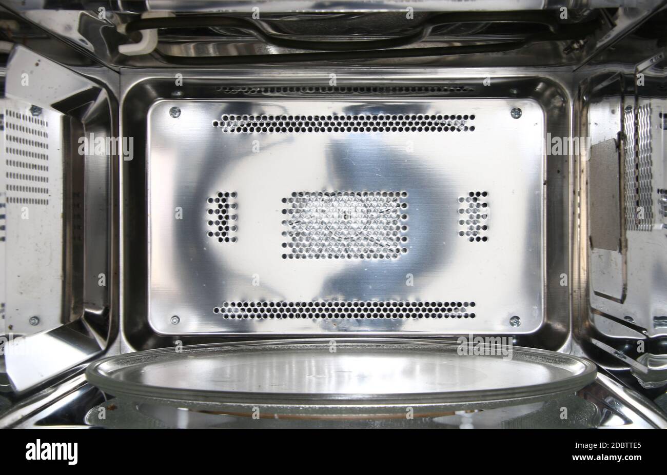 front view inside of empty clean microwave oven interior Stock Photo ...
