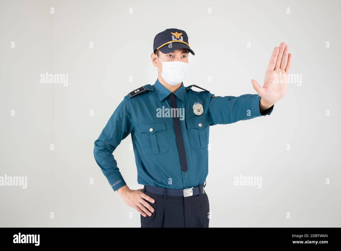 Asian male and female two police officers 039 Stock Photo - Alamy