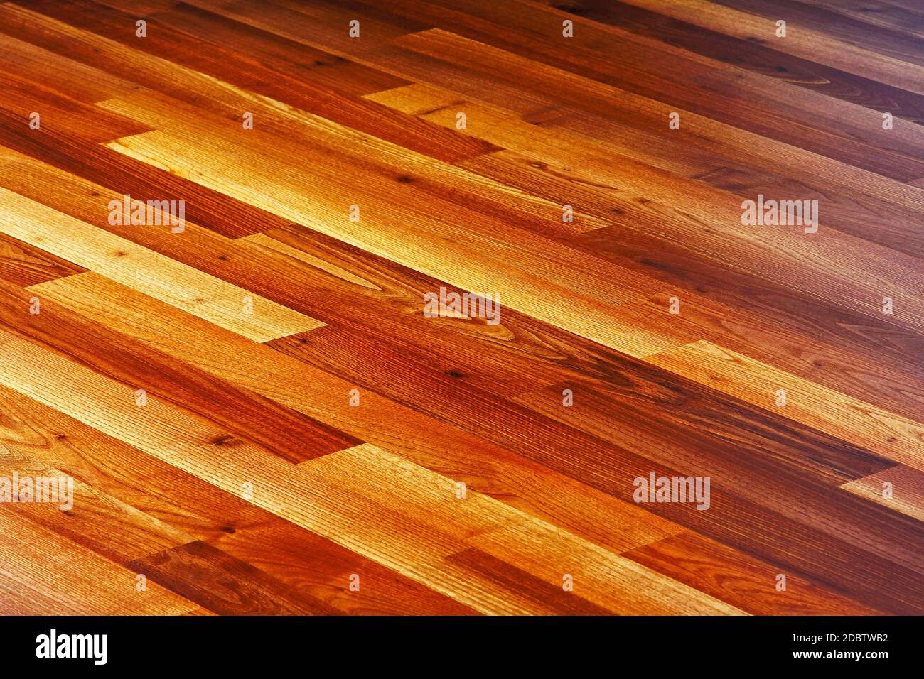 Diagonal lines of laminated hardwood parquet floor Stock Photo - Alamy