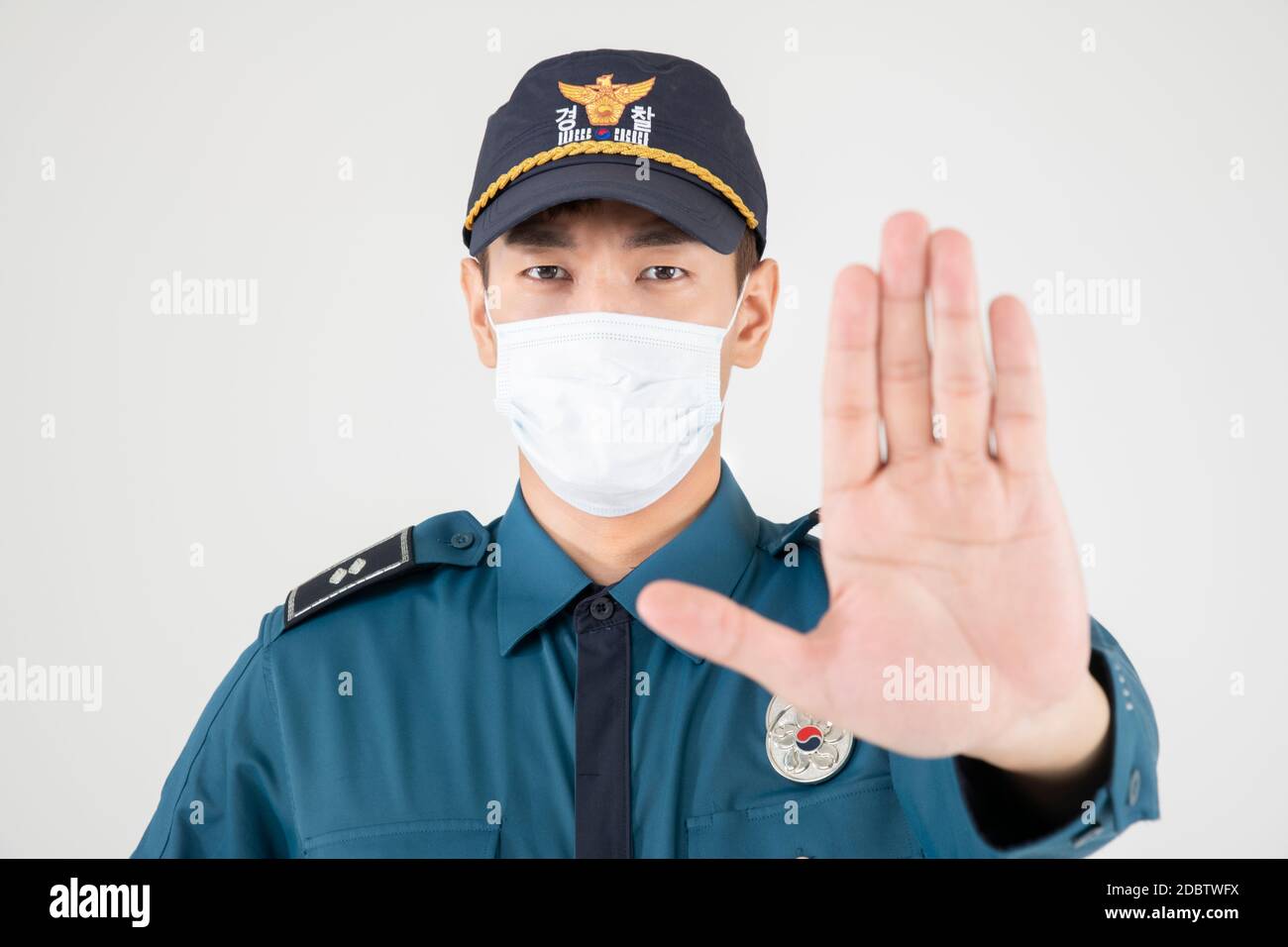 Asian male and female two police officers 038 Stock Photo - Alamy