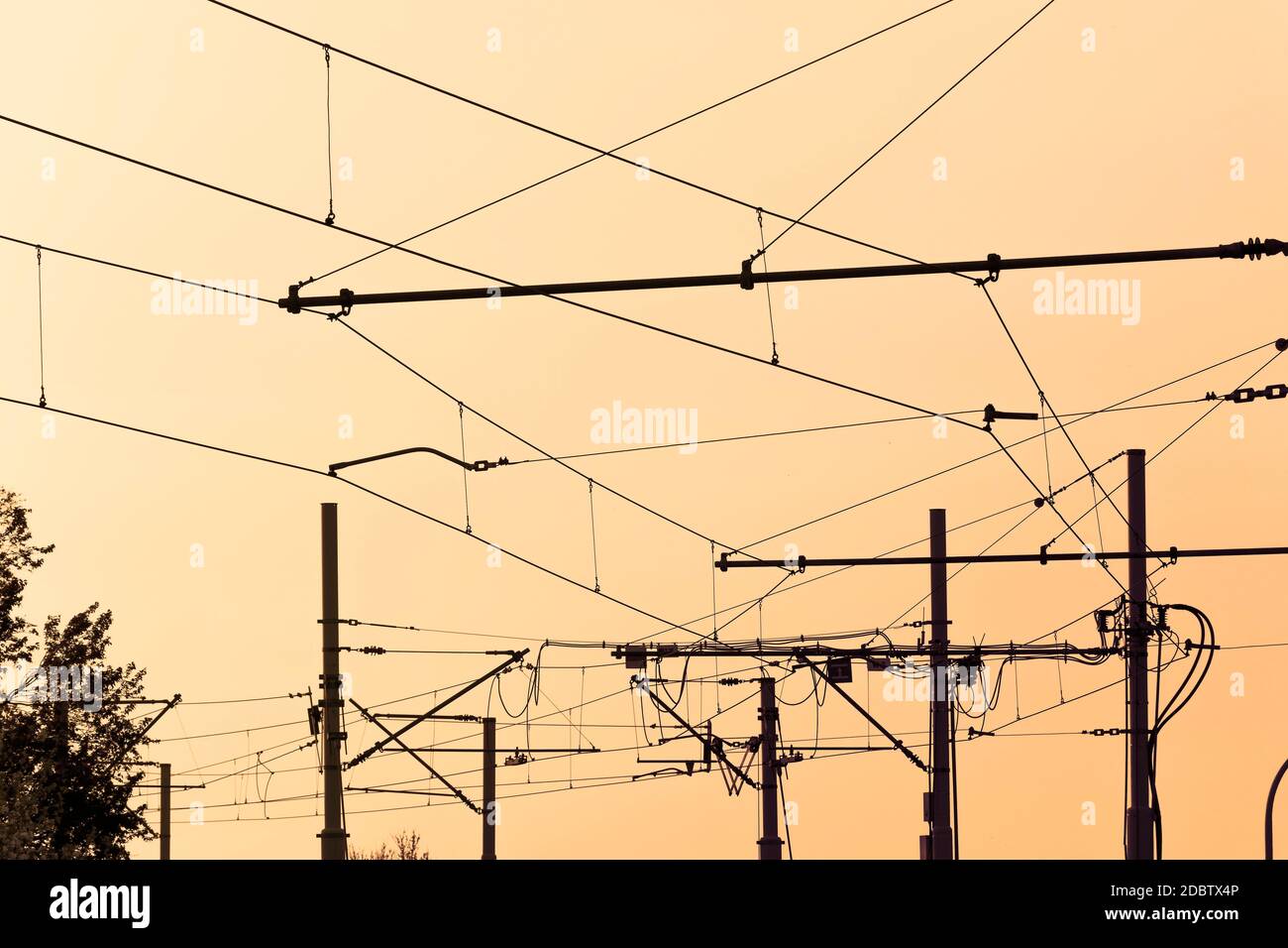 Tram cables at sundown.Tramway overhead traction photo. Electric ...
