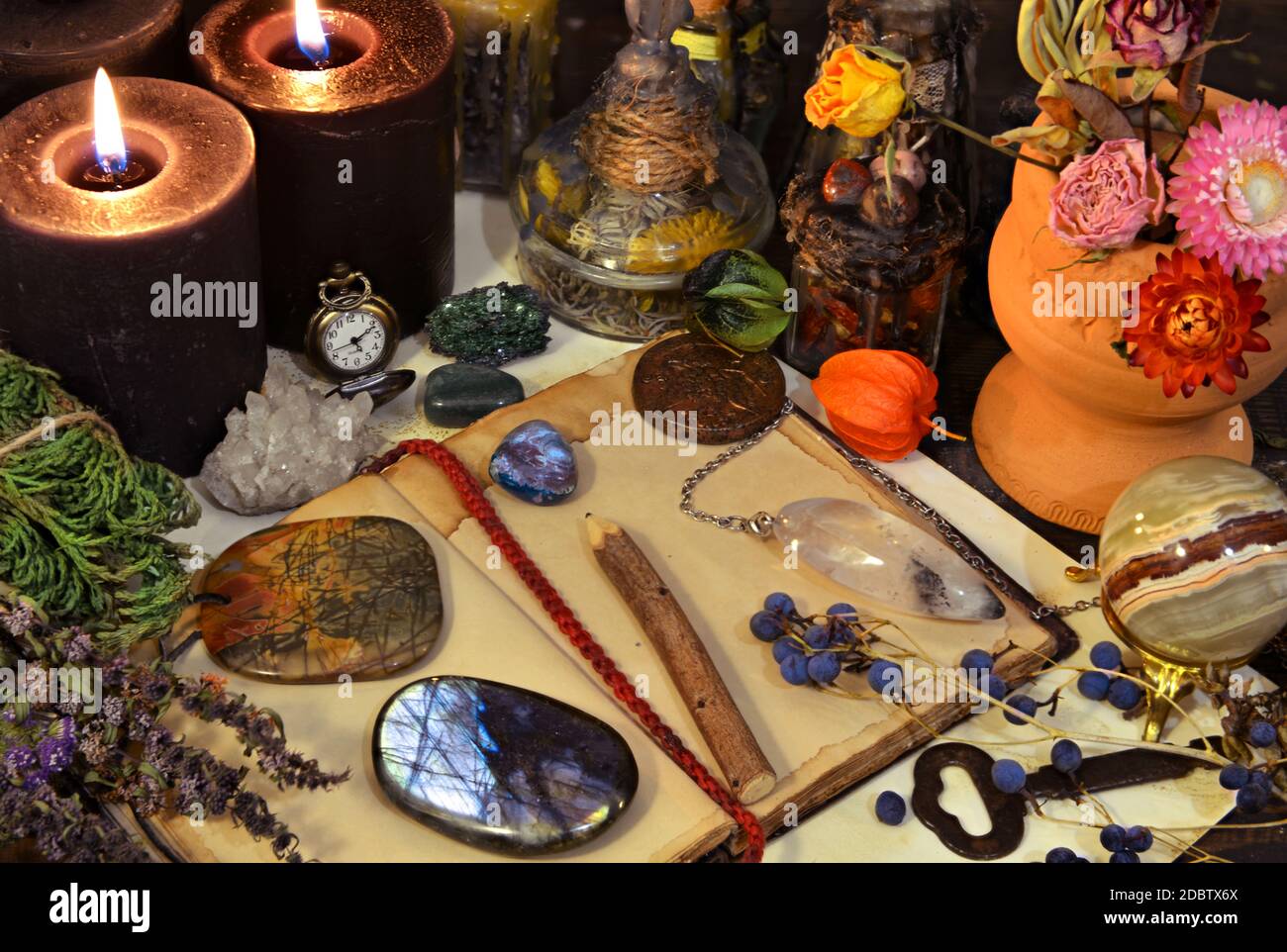 Still life with magic objects, open diary, gemstone, crystall ball and ...