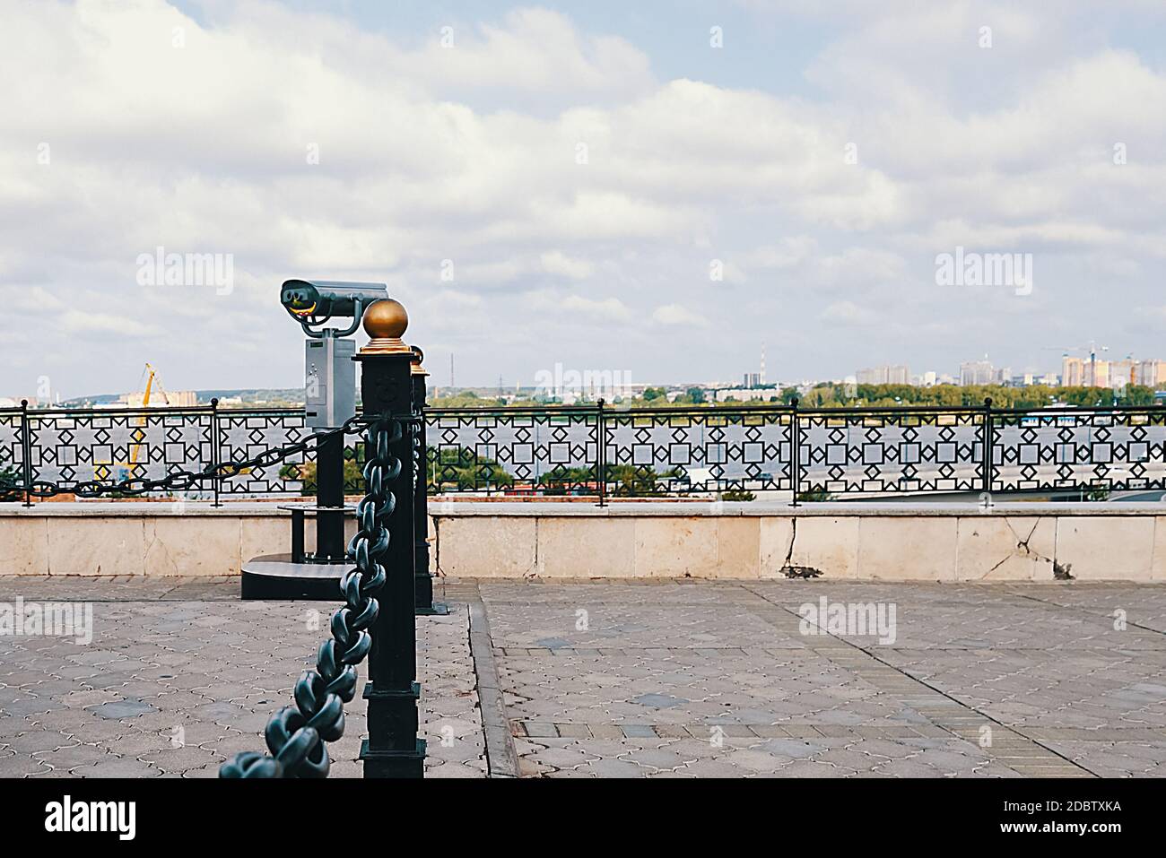 Binoculars on the observation platform in the background of the city ...