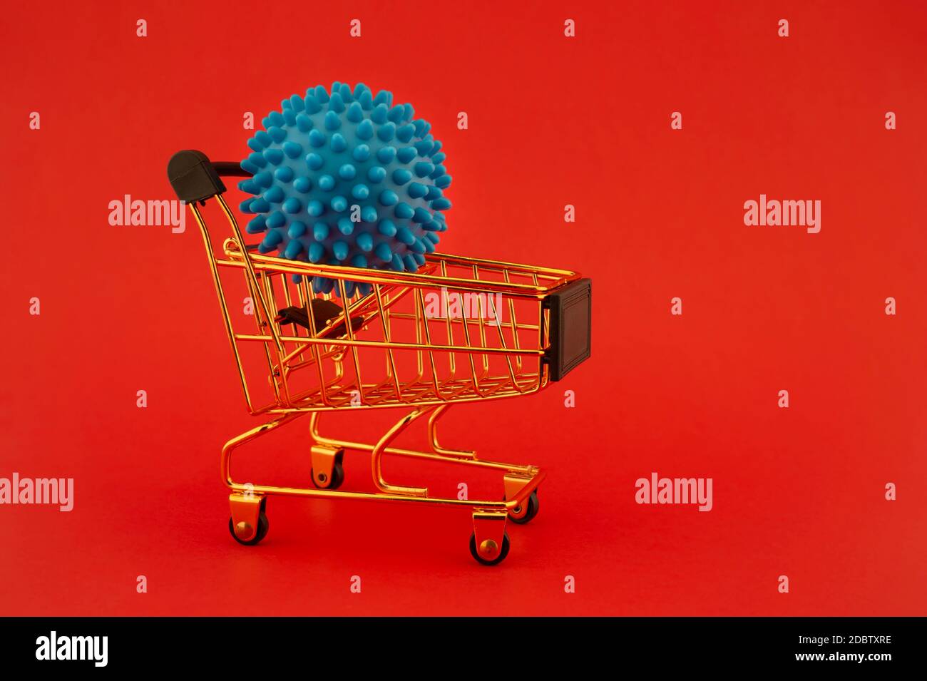 Blue virus molecule on a shopping cart conceptual of the possibility of ...