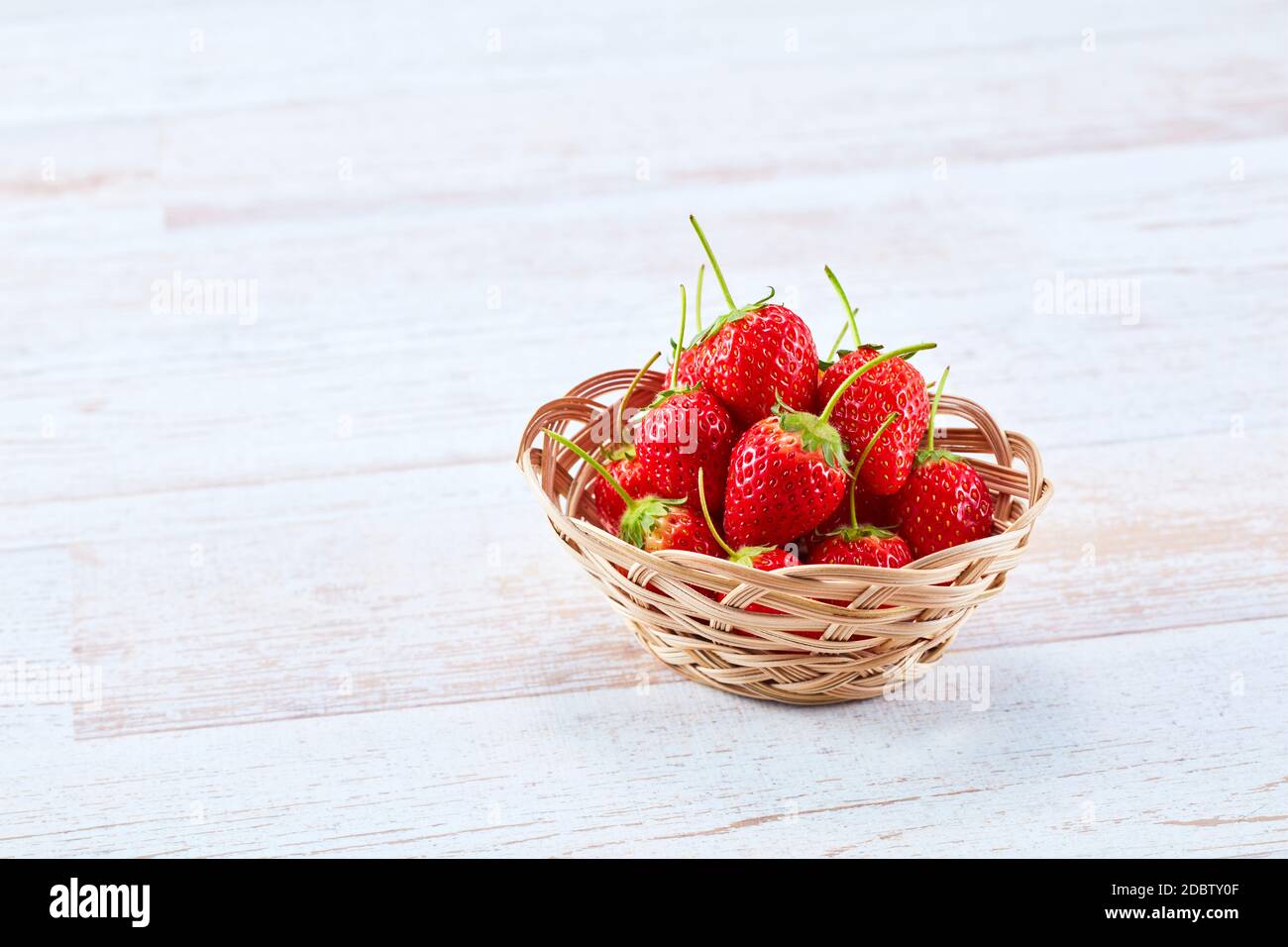 Strawberries In A Basket Stock Photo - Alamy