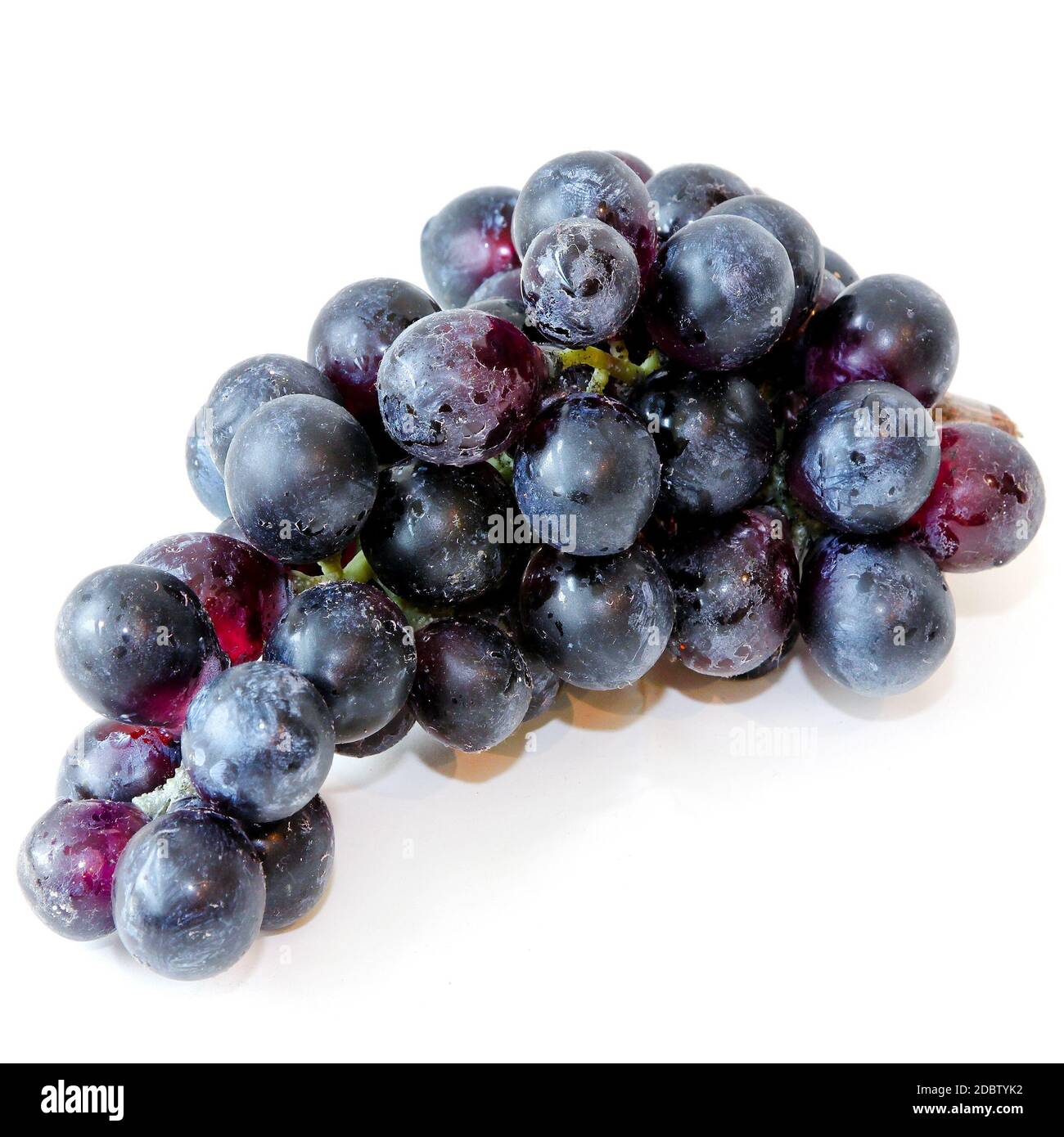 Fresh organic red grapes on white background Stock Photo - Alamy