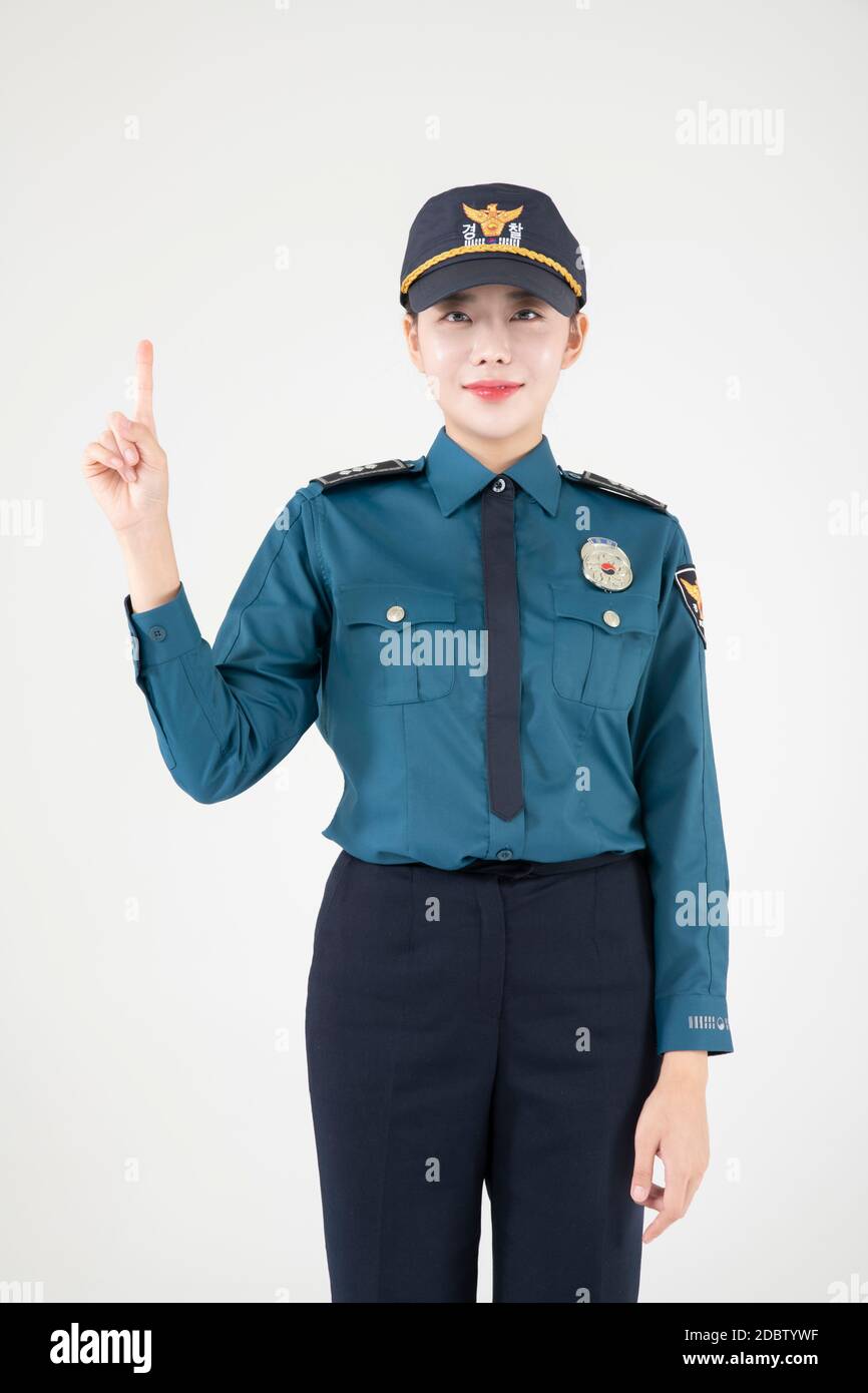 Asian male and female two police officers 077 Stock Photo - Alamy