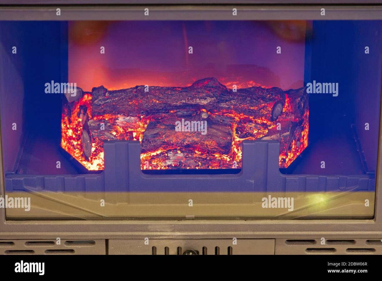 Electric Fireplace With Ceramic Wood Logs Fire Effects Stock Photo - Alamy