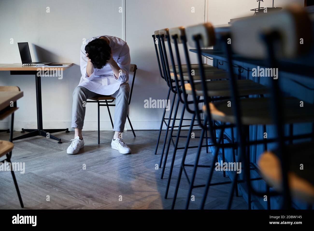 Japanese Chef Depressed In His Restaurant Stock Photo - Alamy