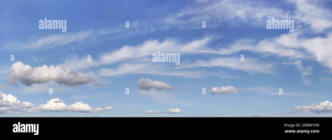 Few white wispy clouds hi-res stock photography and images - Alamy