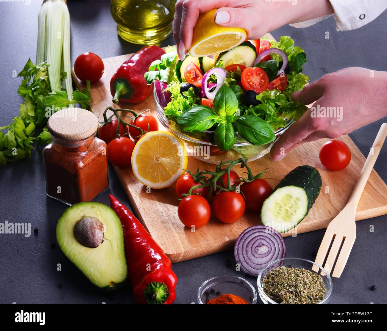 Preparation of a vegetable salad from fresh organic ingredients Stock ...