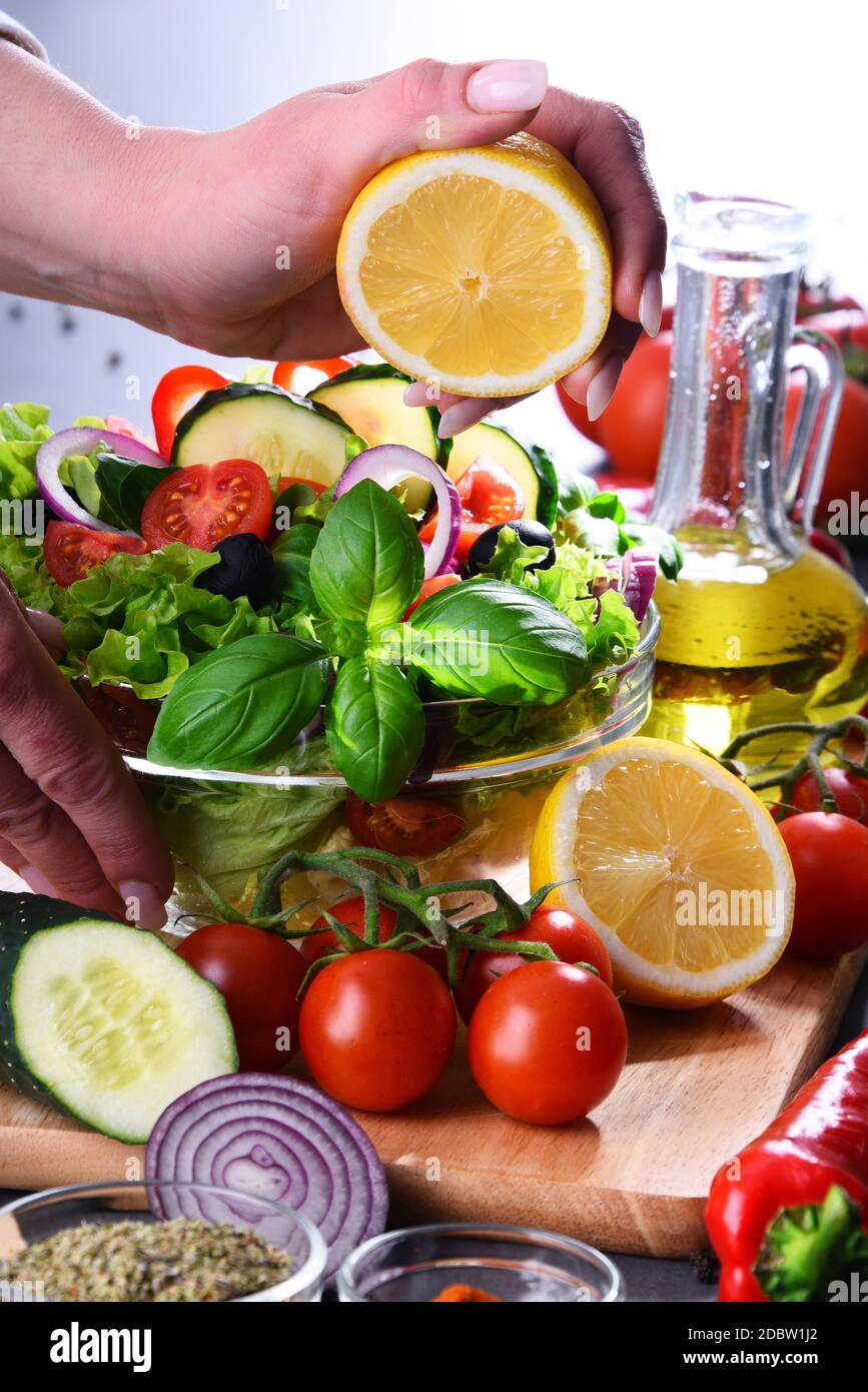 Preparation of a vegetable salad from fresh organic ingredients Stock ...
