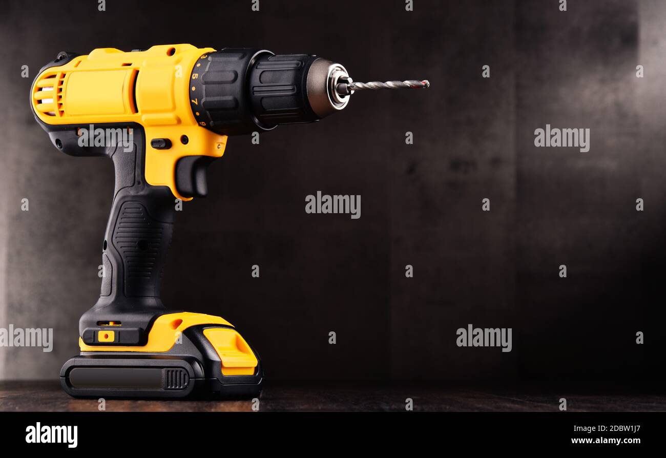Cordless drill with drill bit working also as screw gun Stock Photo - Alamy