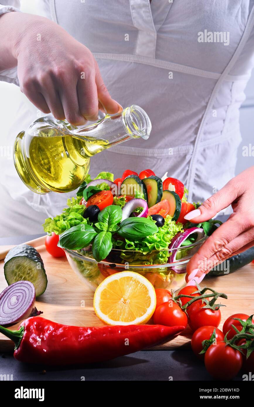 Preparation of a vegetable salad from fresh organic ingredients Stock ...