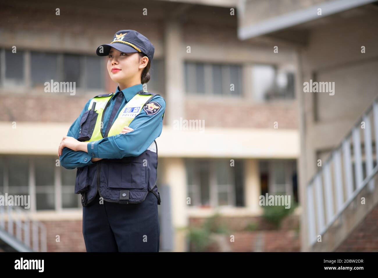 Asian male and female two police officers 110 Stock Photo - Alamy