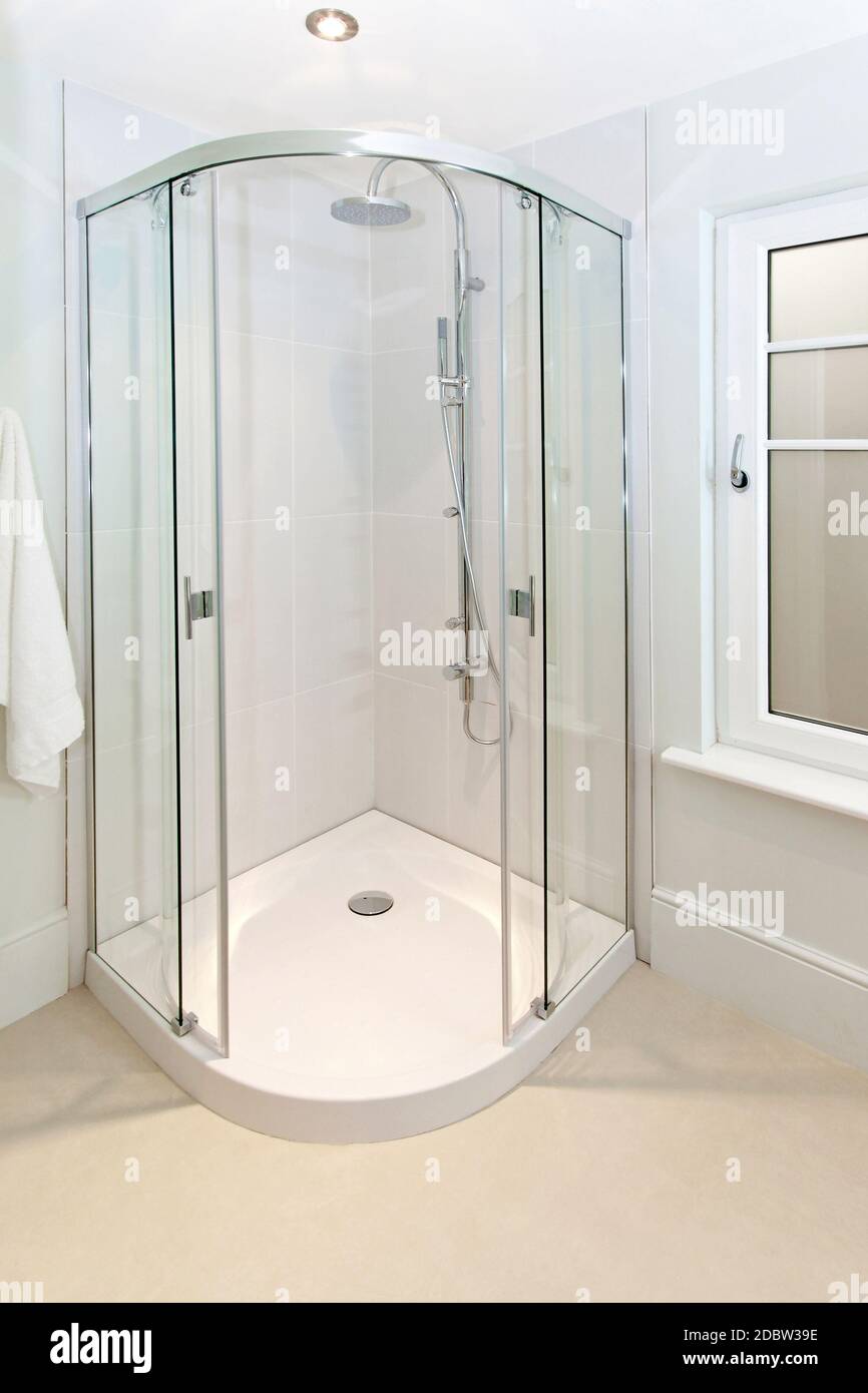 Open glass door at shower in corner Stock Photo - Alamy