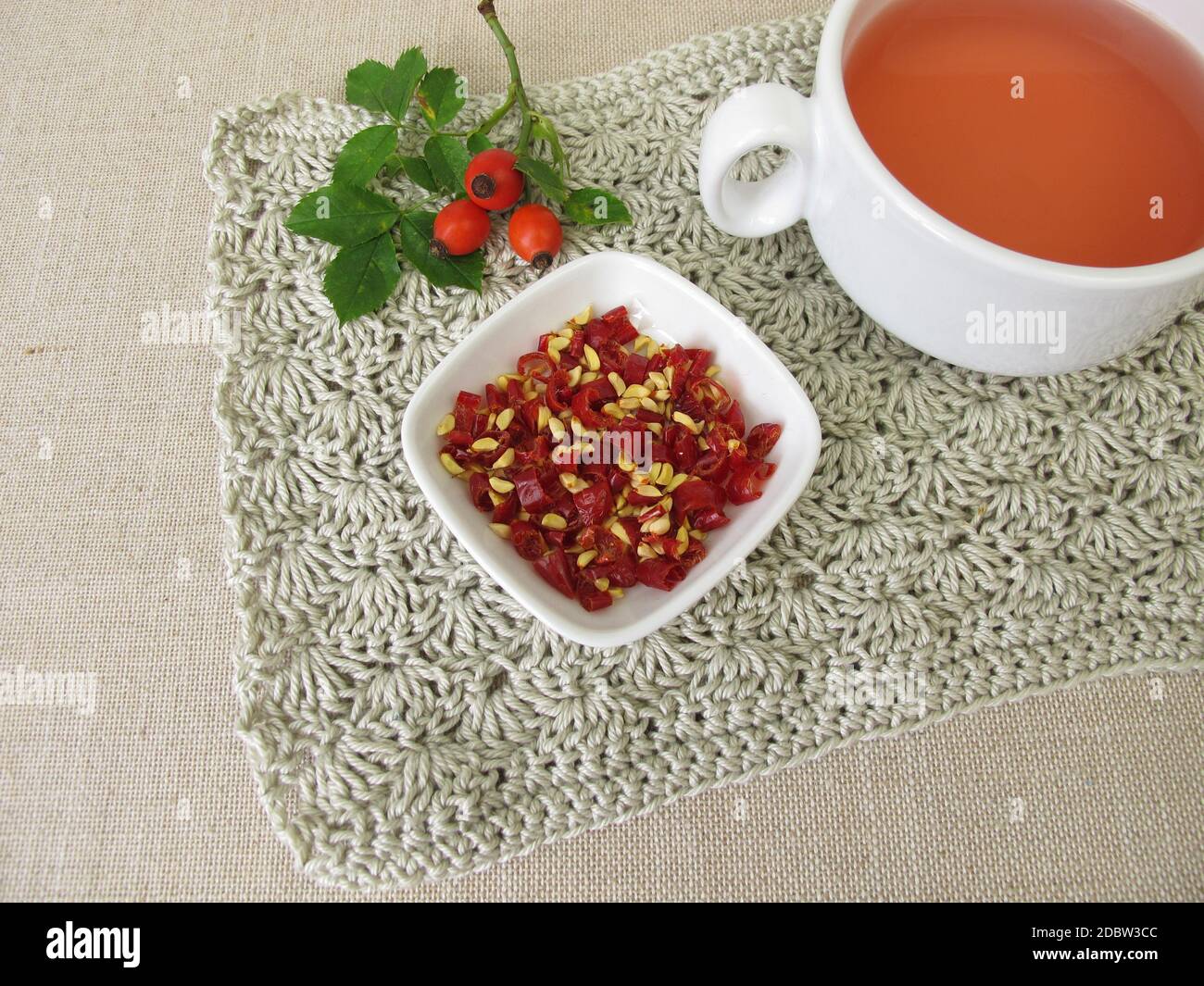 Red rosehip tea from seeds and hips Stock Photo - Alamy