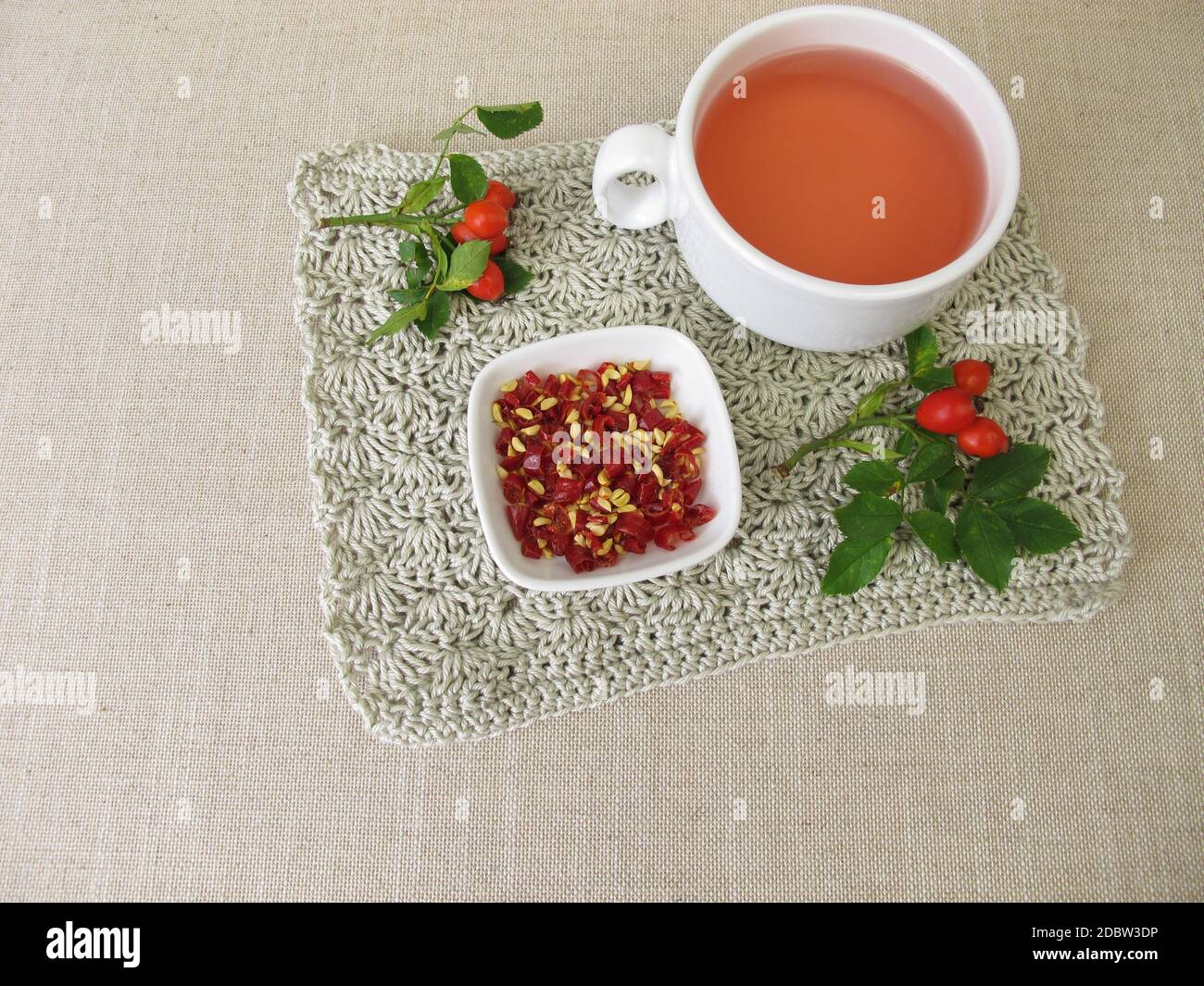 Red rosehip tea from seeds and hips Stock Photo - Alamy