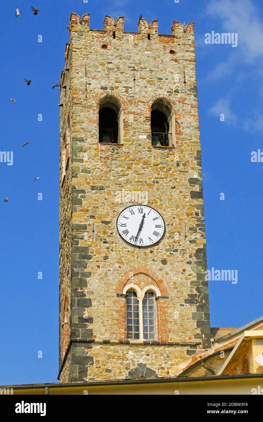 Medieval castle tower with clock in Italy Stock Photo - Alamy