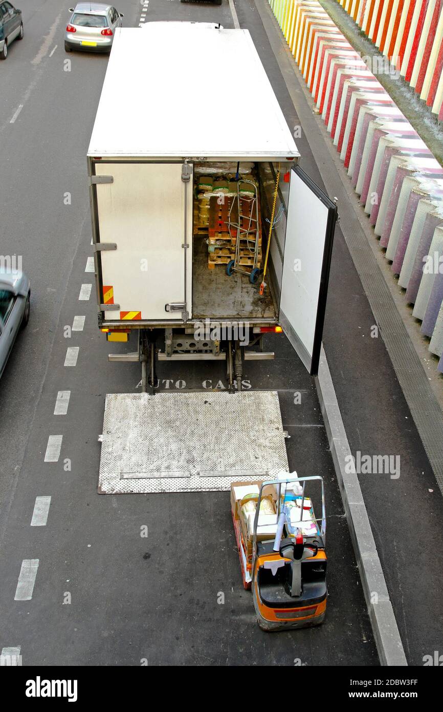 Commercial goods delivery van with lift ramp Stock Photo - Alamy