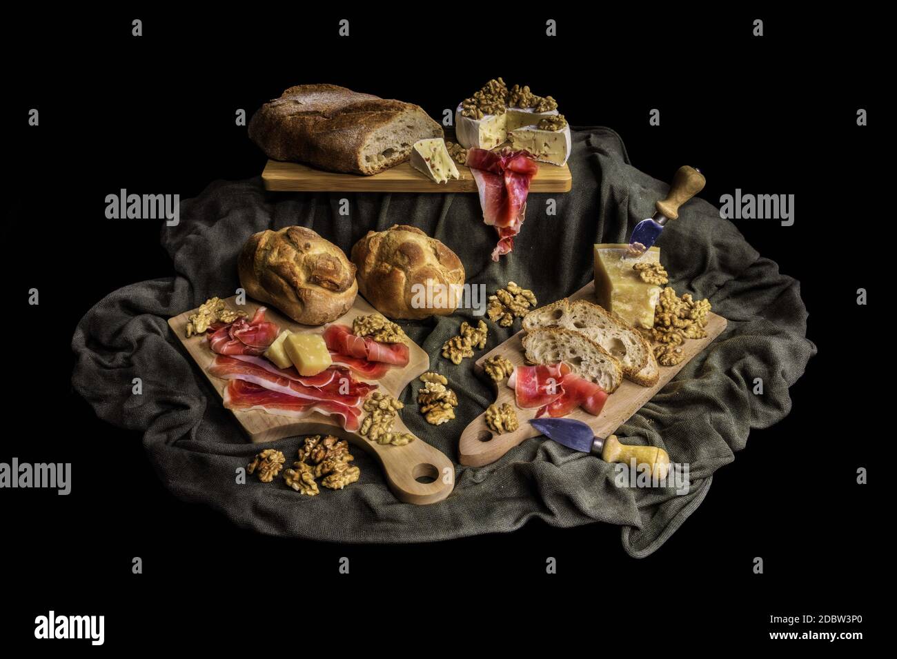 Italian starter with ham, cheese, wallnuts and bread Stock Photo - Alamy