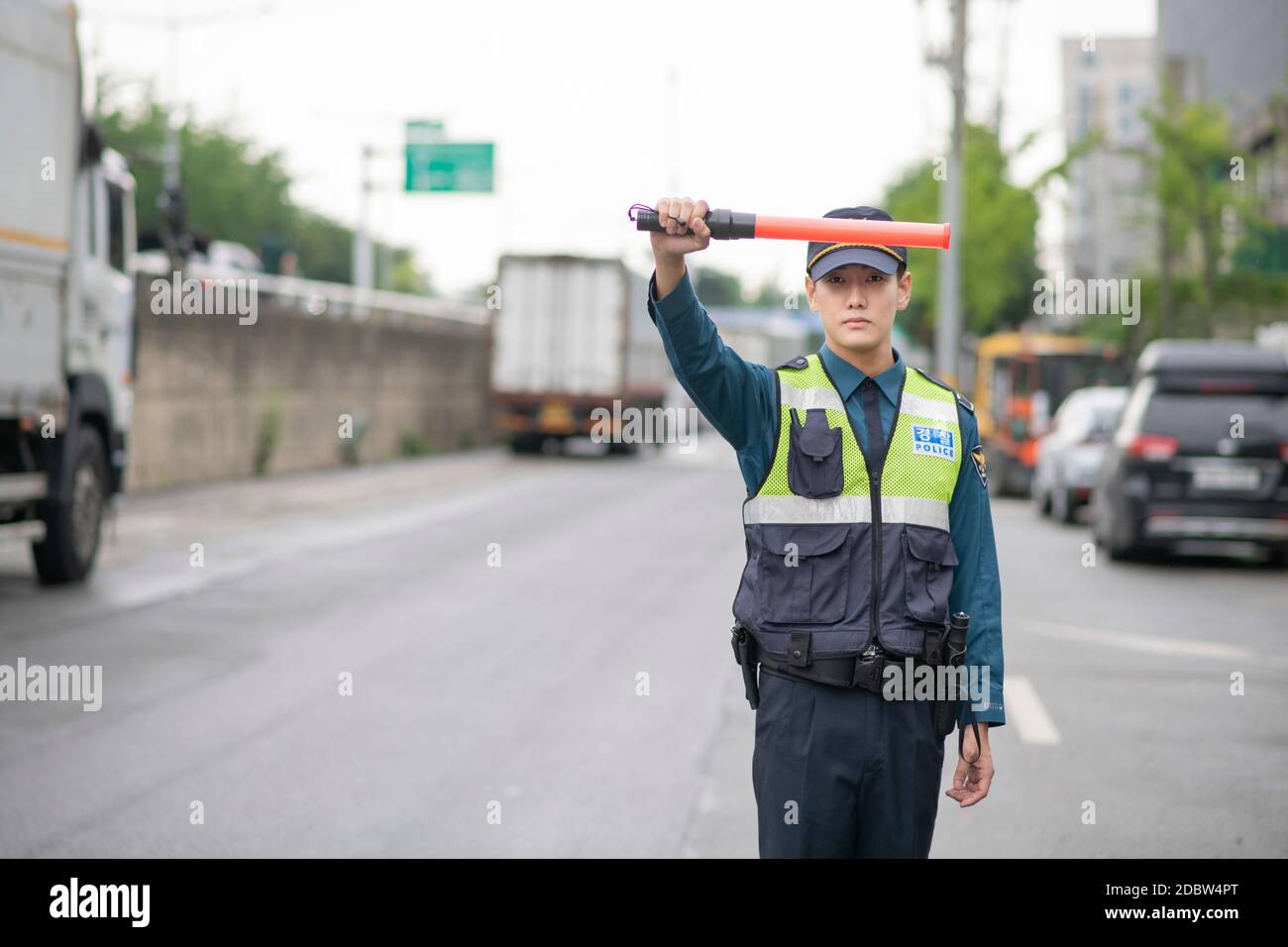 Asian male and female two police officers 129 Stock Photo - Alamy