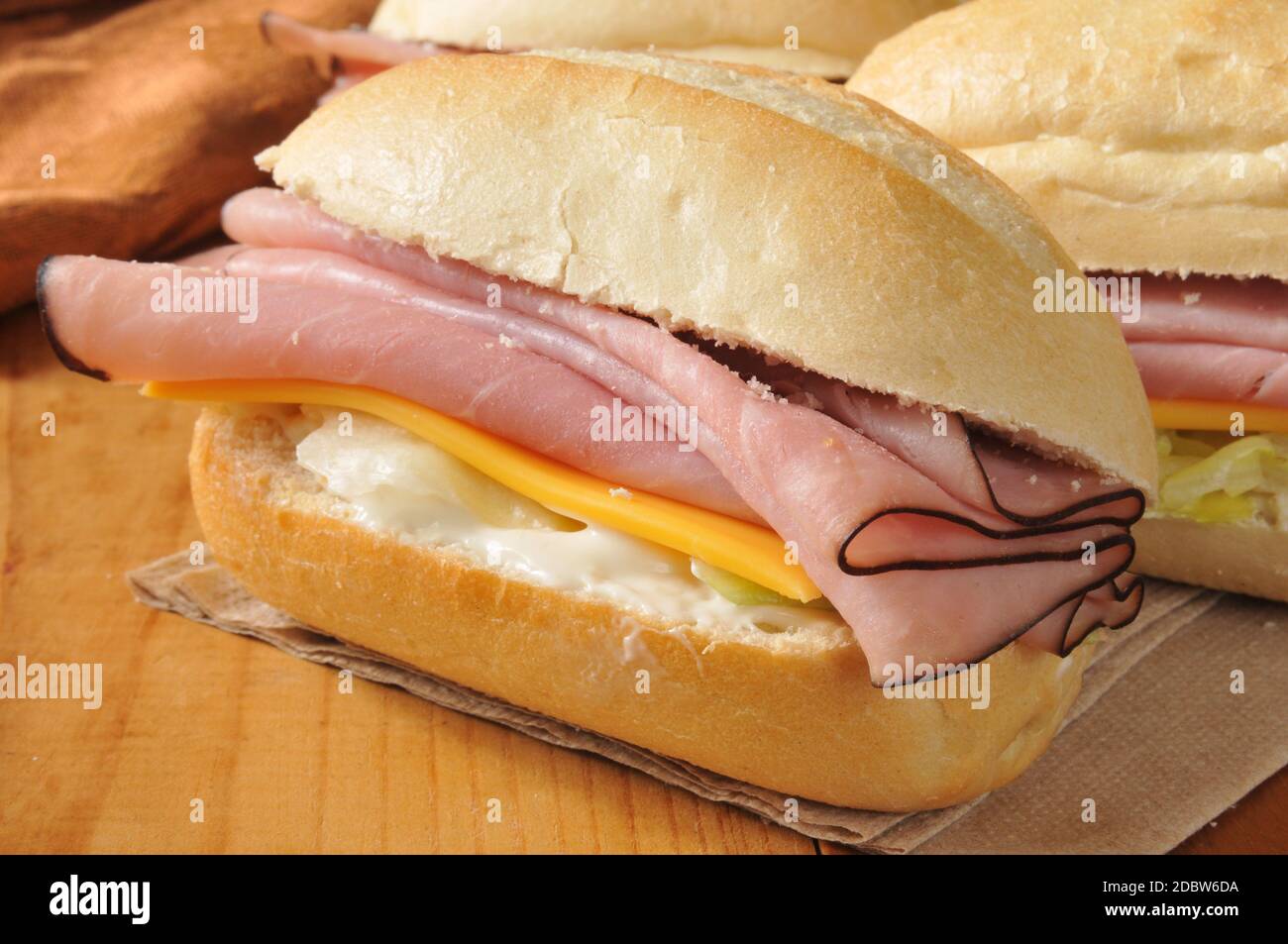 Mini ham and cheese sandwiches on a cutting board Stock Photo - Alamy